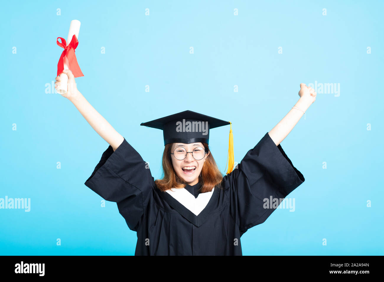 happy success graduation girl hands up Stock Photo - Alamy