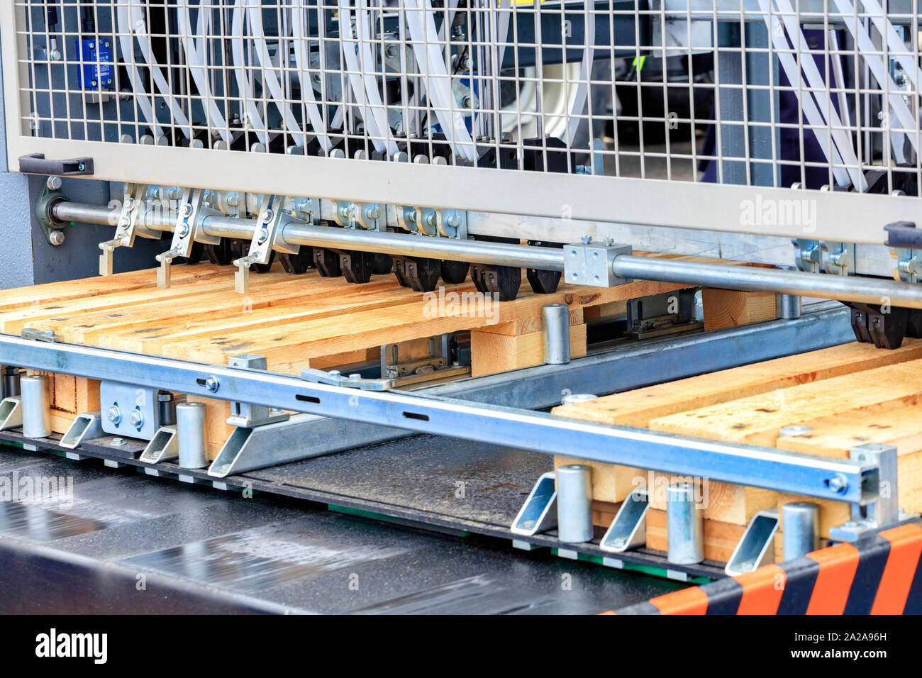 Production of wooden pallets on a modern automatic line for woodworking ...