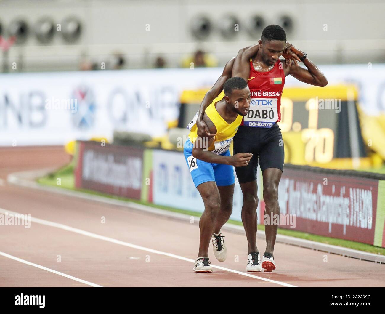 Doha, Qatar. 2nd October, 2019. Braima Suncar Dabo (R) of Guinea-Bissau ...