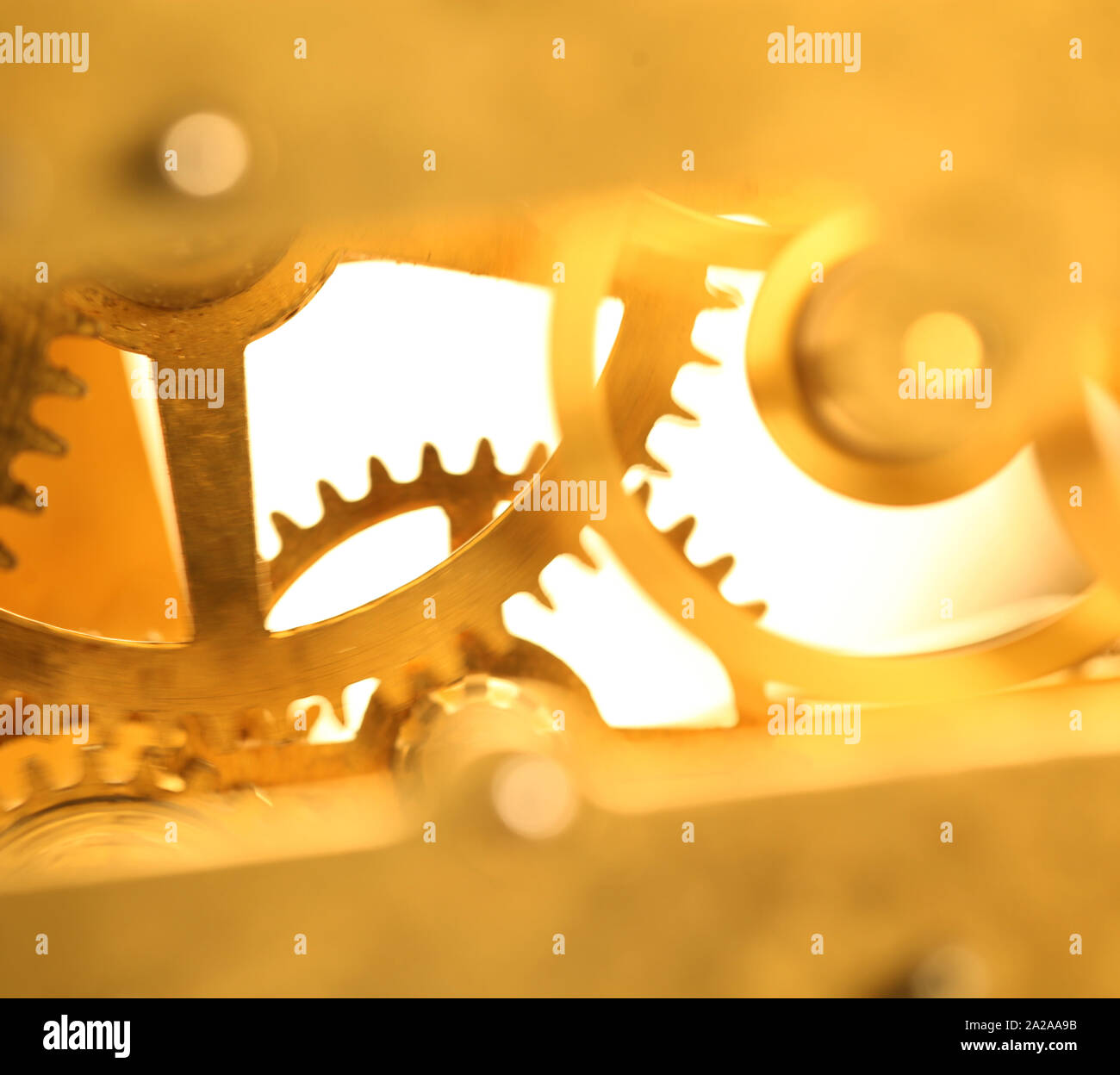 Close up of a internal clock mechanism Stock Photo - Alamy