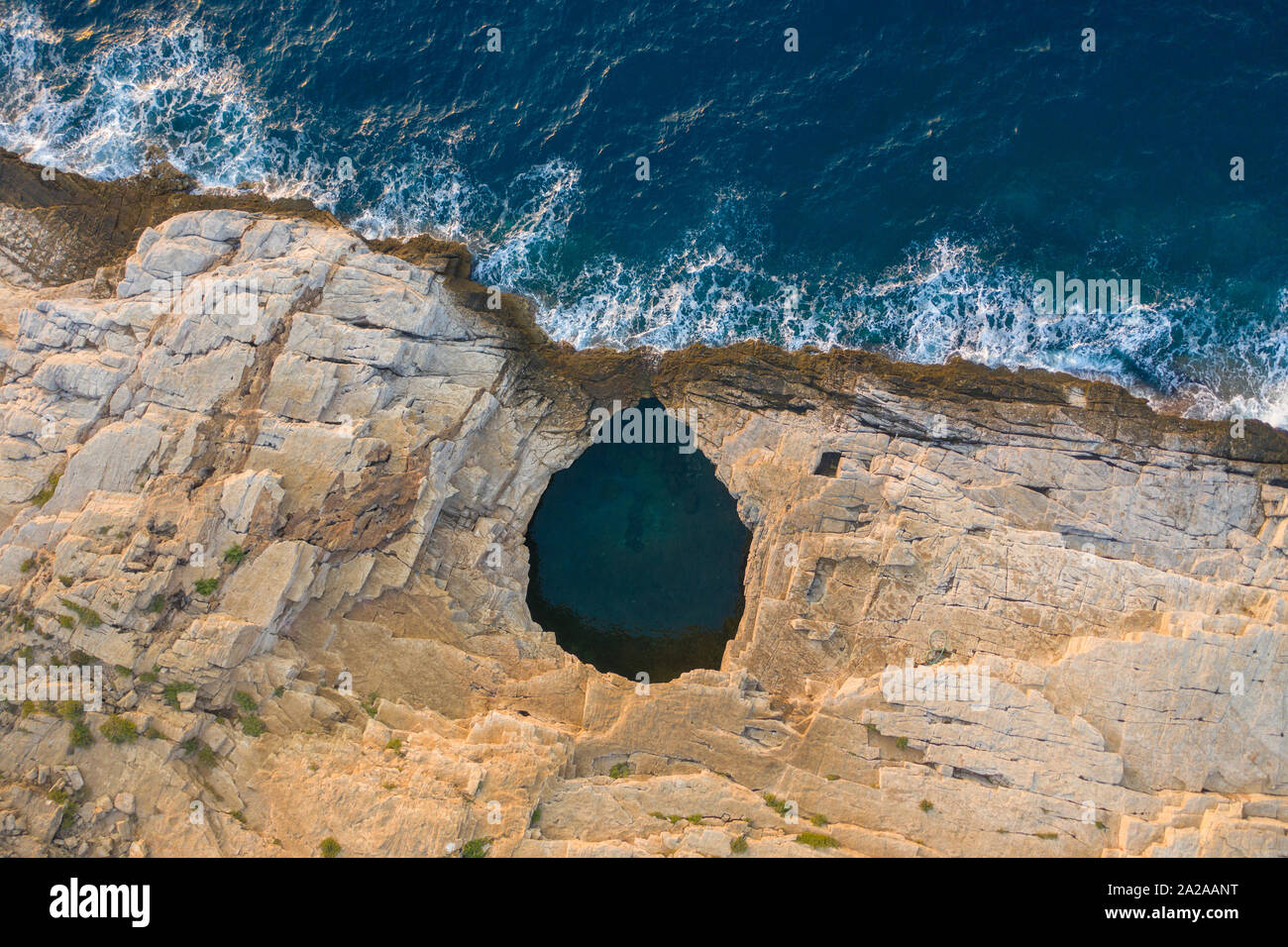 Aerial drone view of Giola lagoon, a natural seaside pool in Thassos ...