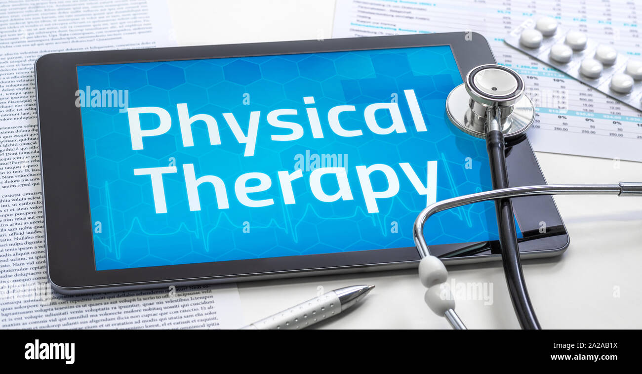 The word Physical Therapy on the display of a tablet Stock Photo - Alamy