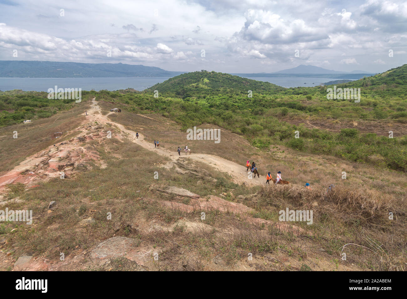 Tourists walking hiking trekking tour trail to Taal volcano, Batangas ...