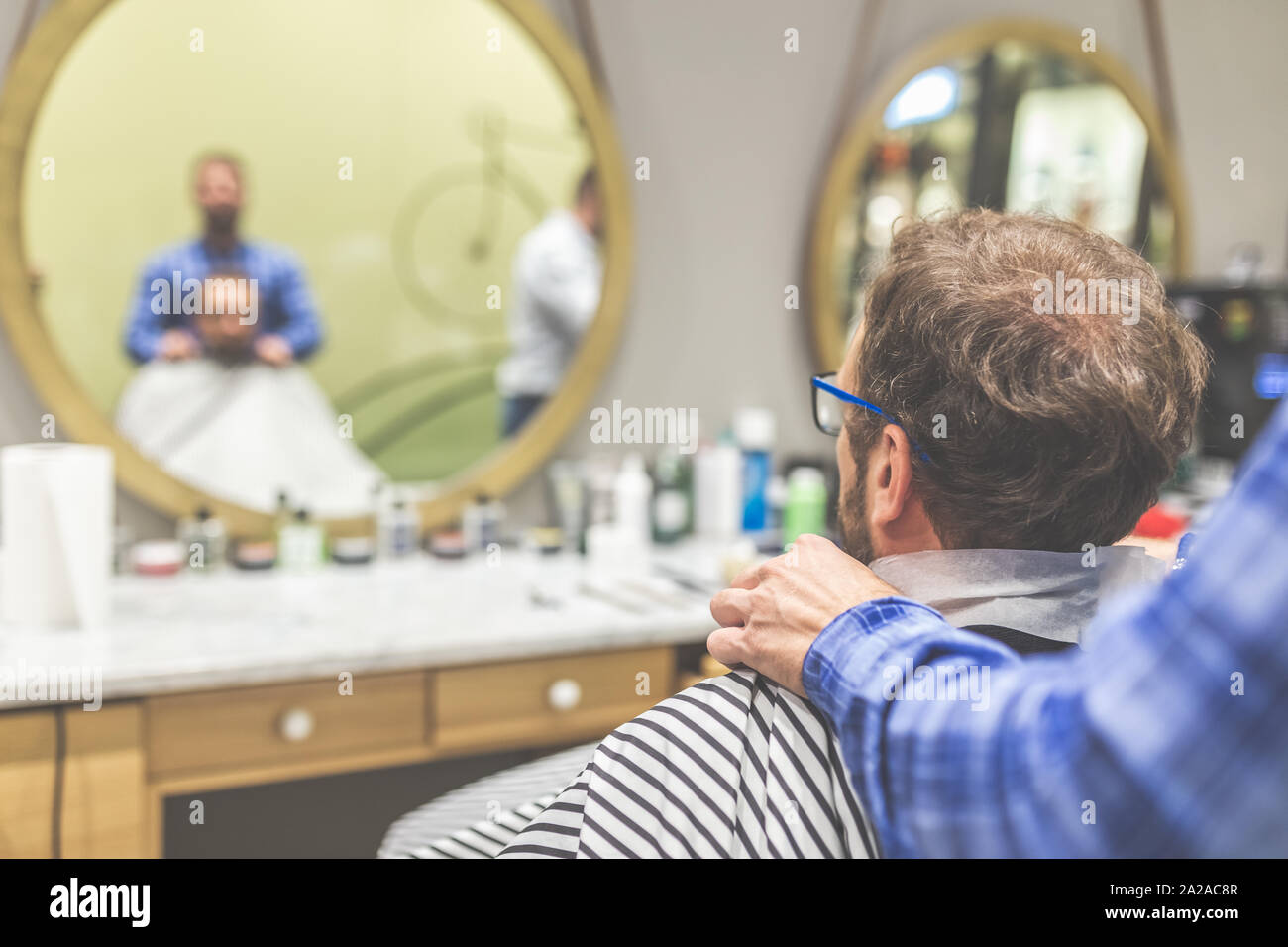 Man barbering in barber hi-res stock photography and images - Alamy