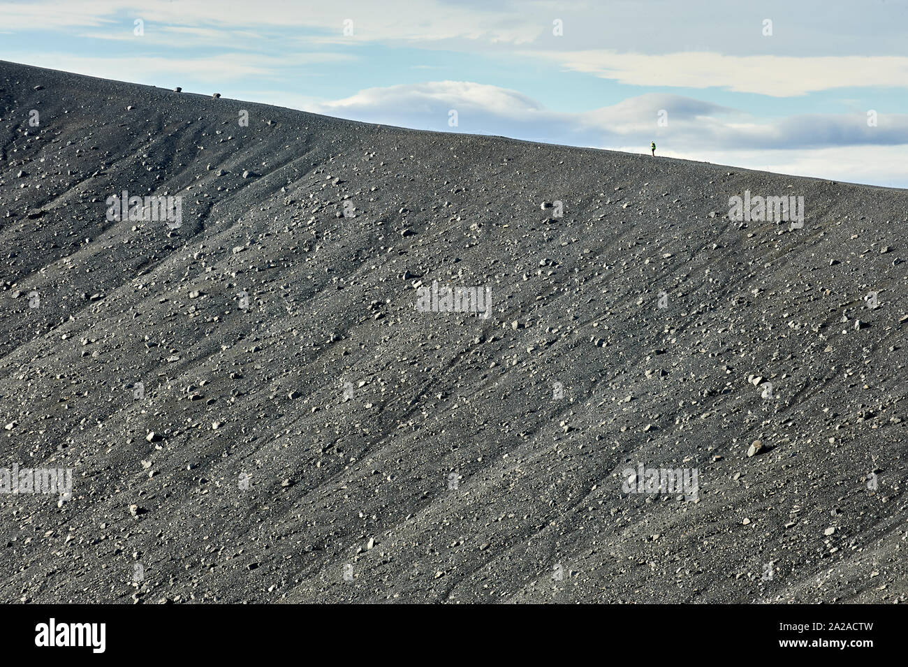 Person walking on crater rim of Hverfjall volcano at Myvatn lake Stock ...