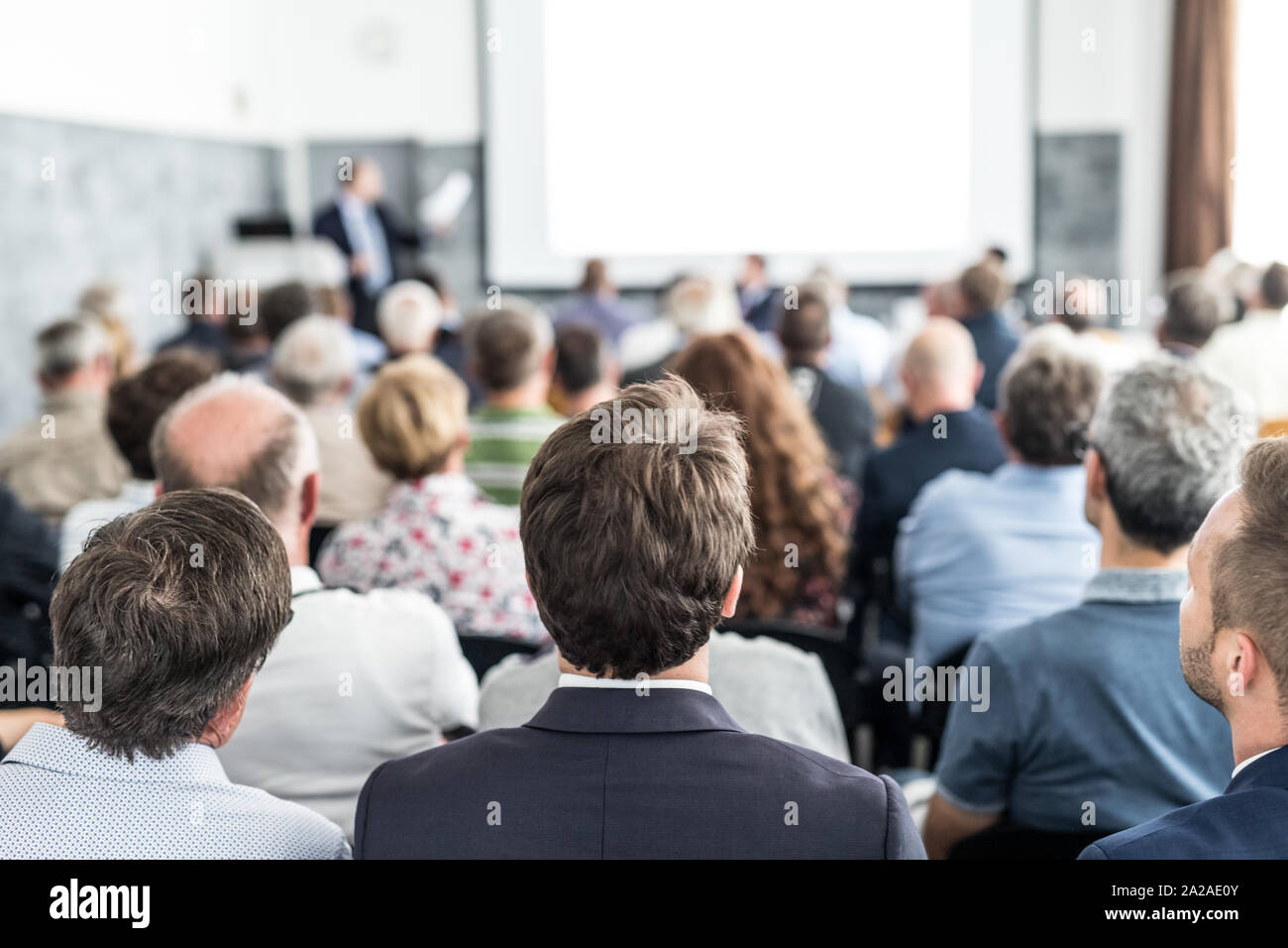 Business speaker giving a talk at business conference event Stock Photo ...