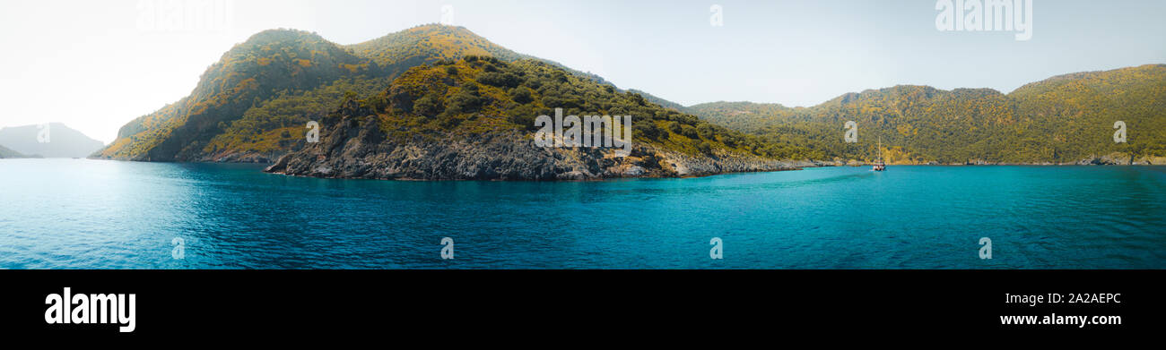 Secluded cove and coastline with calm sea Stock Photo - Alamy