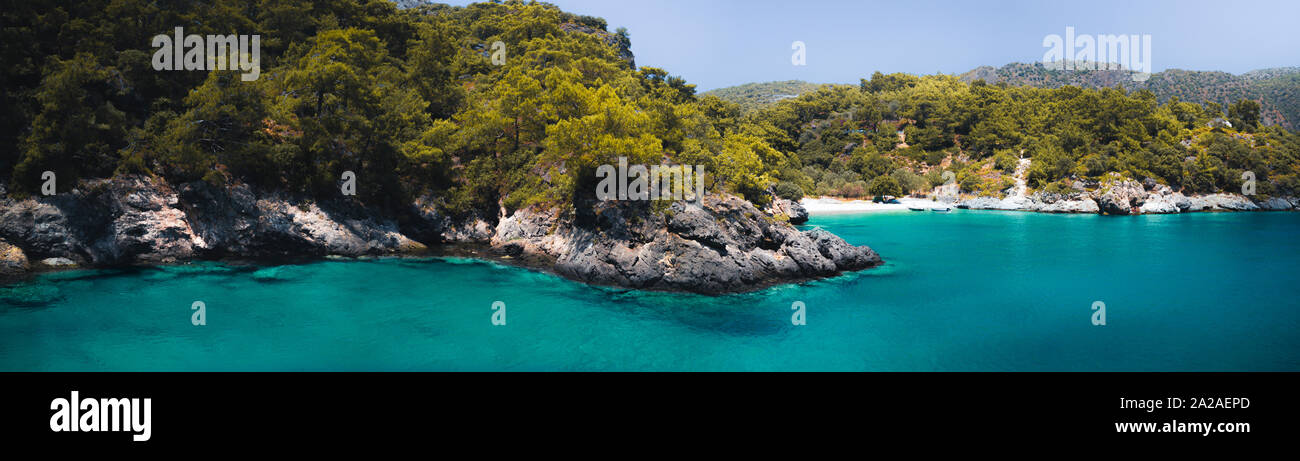 Secluded cove and coastline with calm sea Stock Photo - Alamy