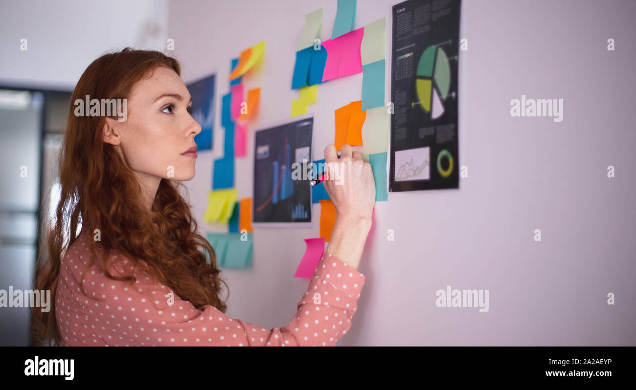 Creatives working in an office Stock Photo - Alamy