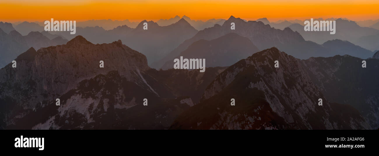 Mangart Alps mountain sunset panorama Stock Photo - Alamy