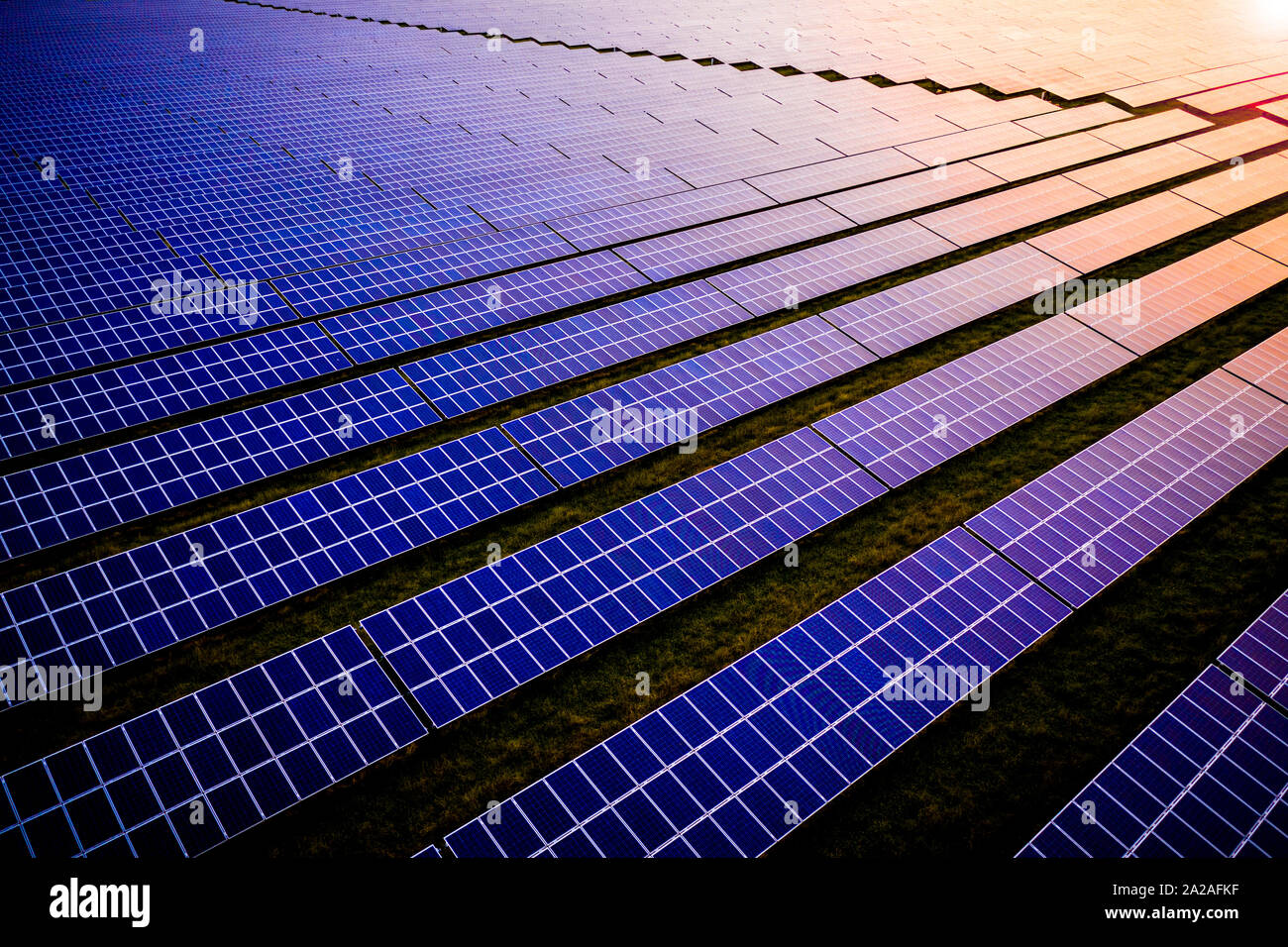 Vibrant solar panels at sunrise at a modern solar farm Stock Photo - Alamy