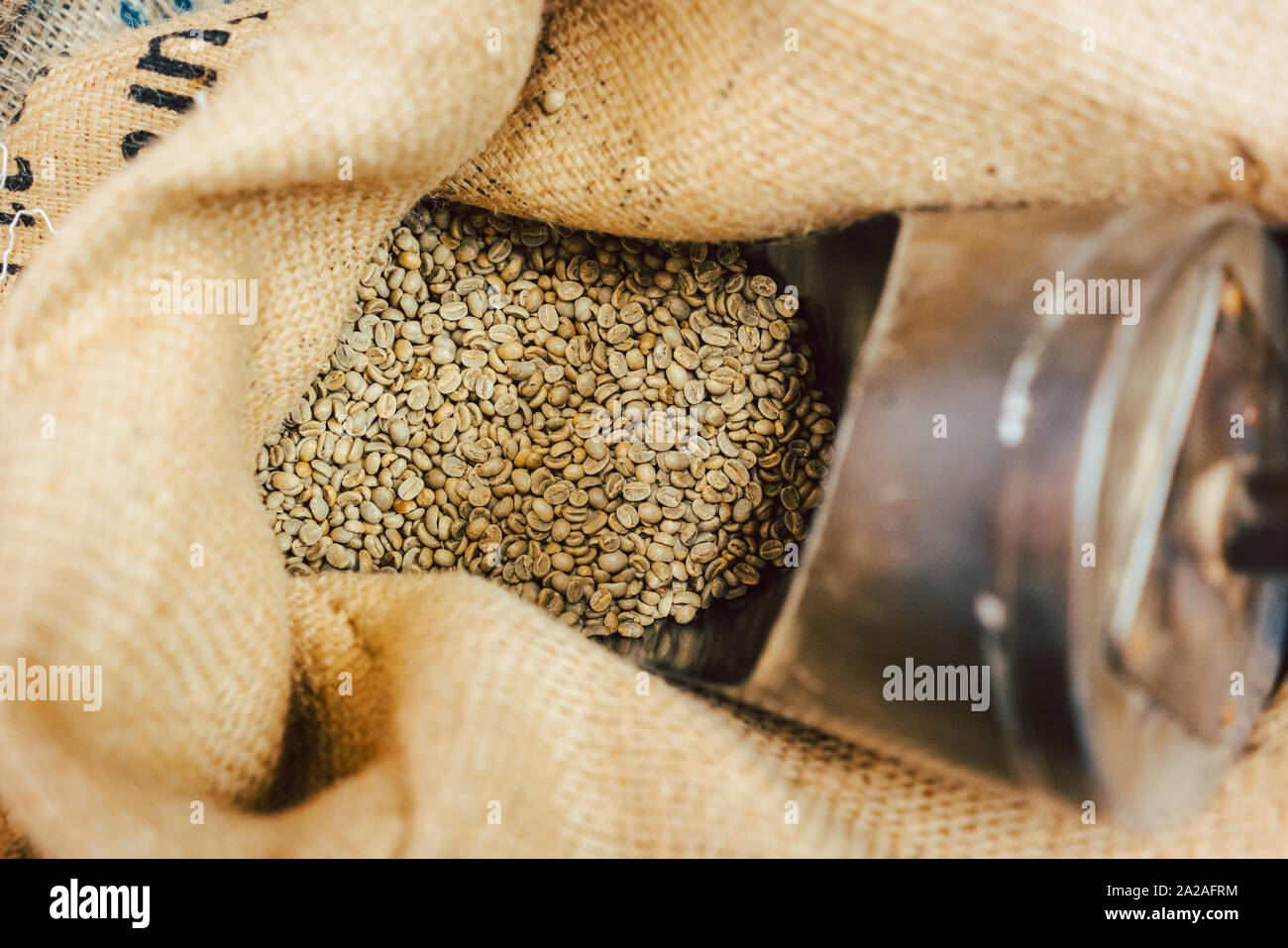 Bag of raw coffee beans Stock Photo - Alamy