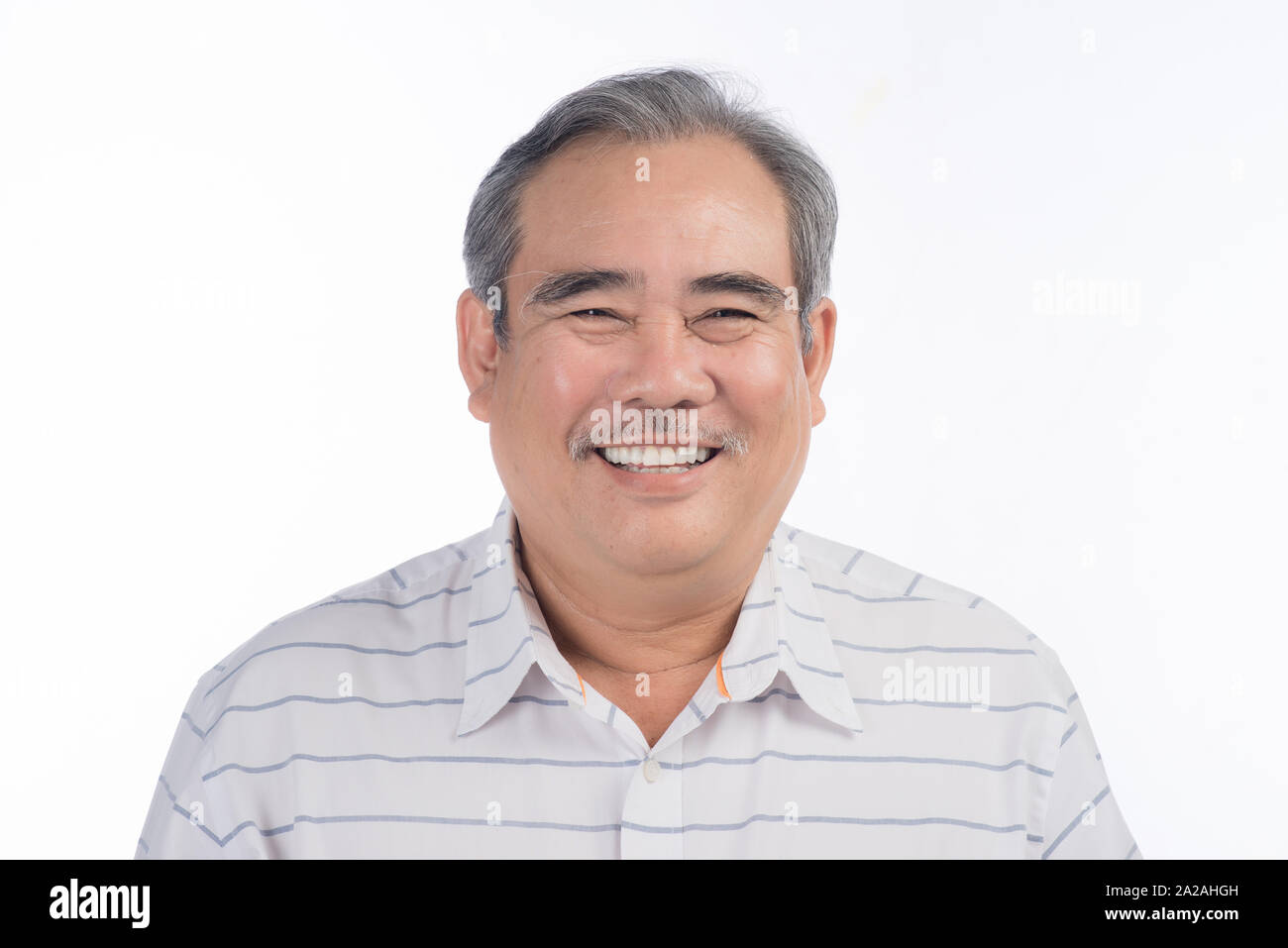 Portrait of a happy asian senior man smiling isolated on white Stock ...
