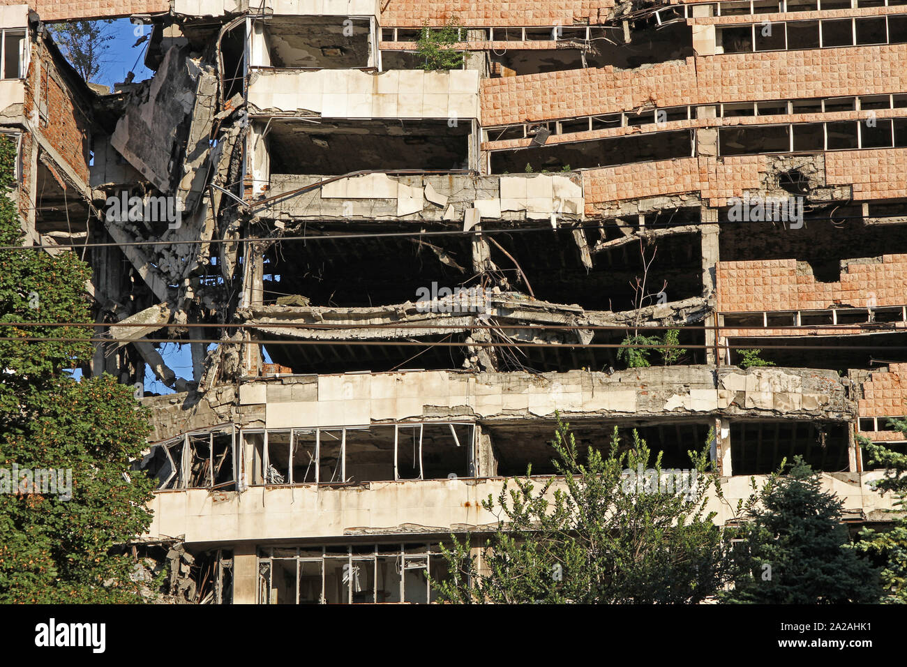 Close-up of apartment building blocks and old remains of The Yugoslav ...