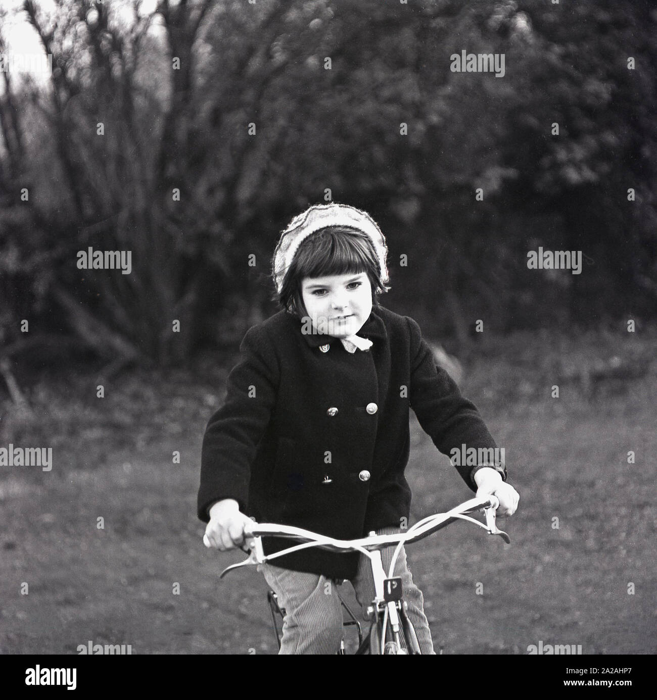 1960s, historical, a young girl on her Pavemaster bicycle, England, UK ...