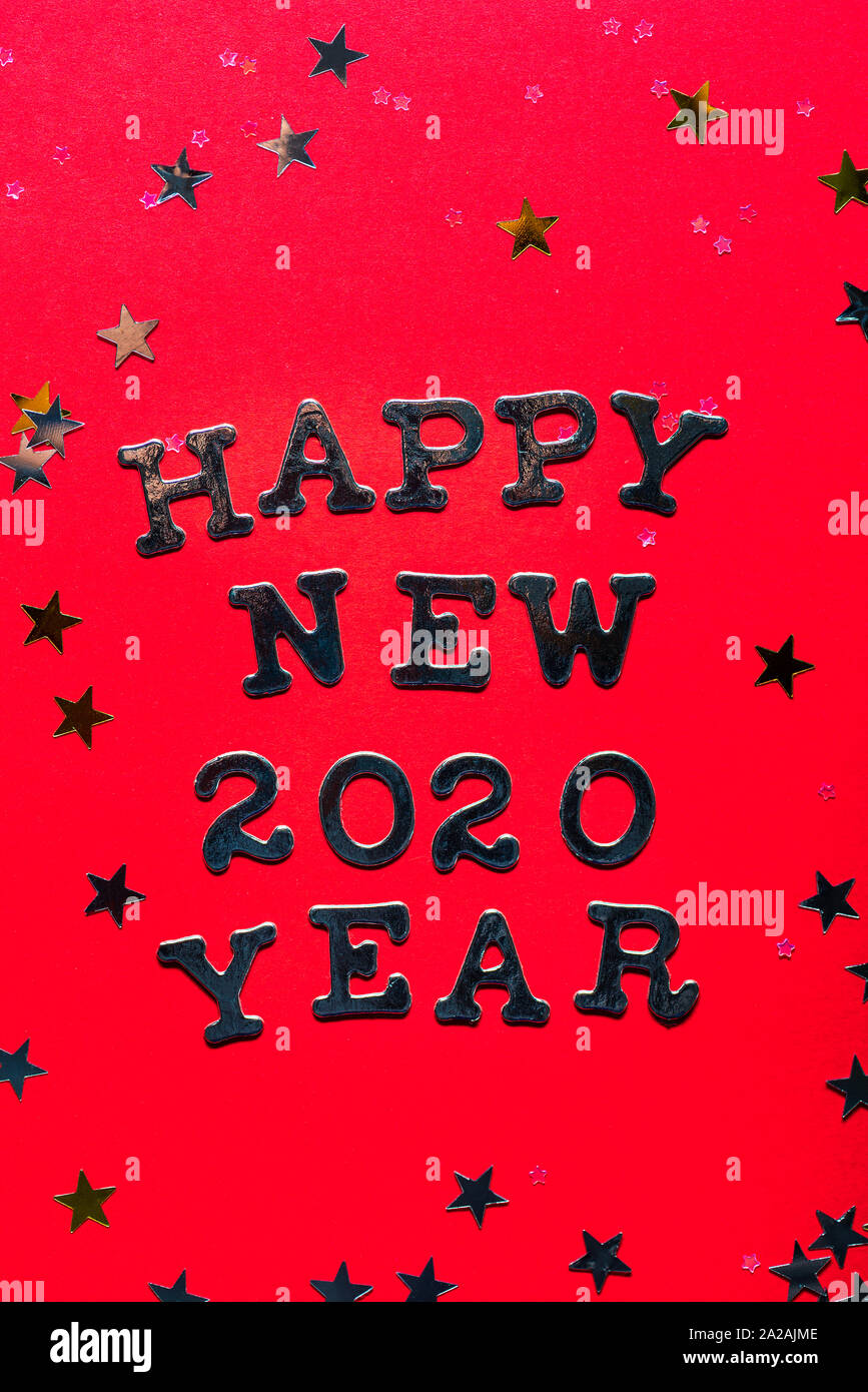 Happy New 2020 Year letters on bright red background Stock Photo - Alamy