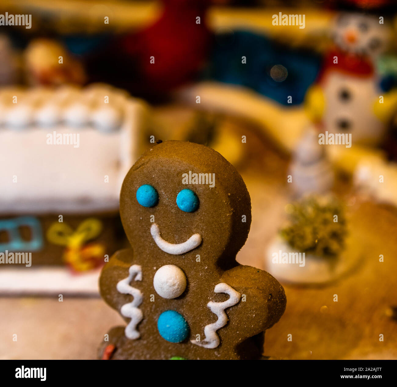 Christmas decorations against blurred background. Happy gingerbread man ...