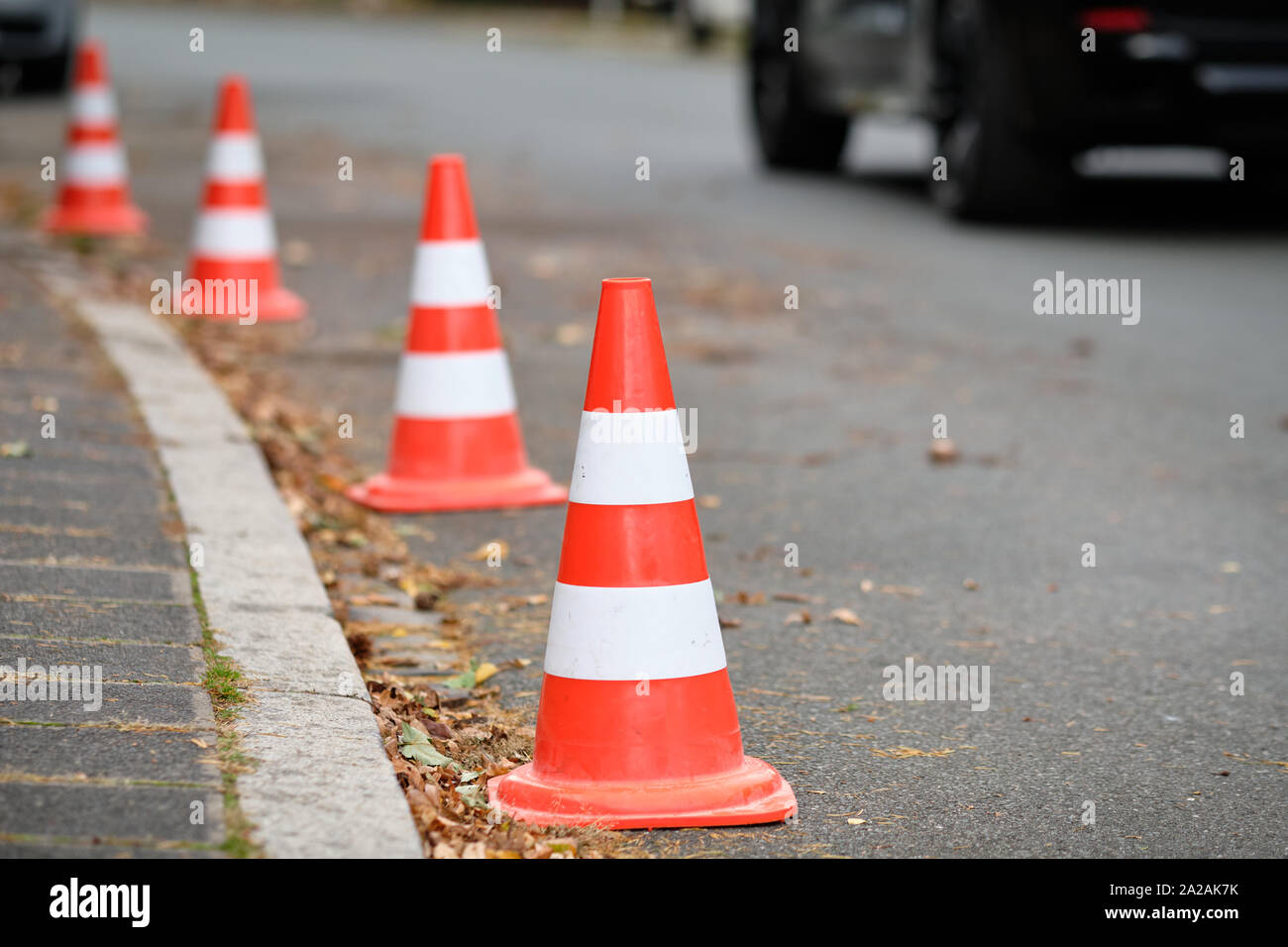 Traffic cone on pavement hi-res stock photography and images - Alamy