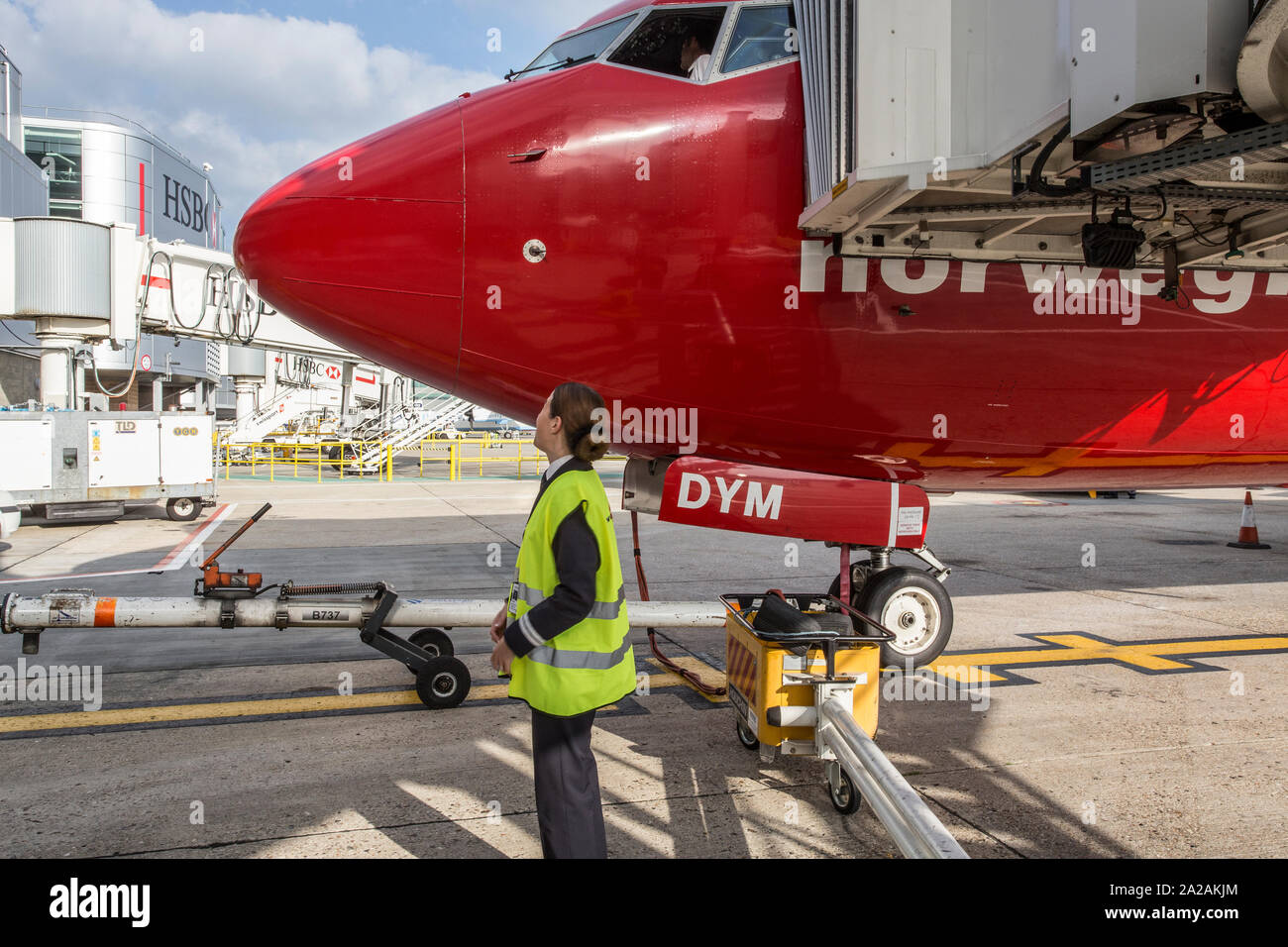 Lady pilot doing pre flight checks hi-res stock photography and images ...