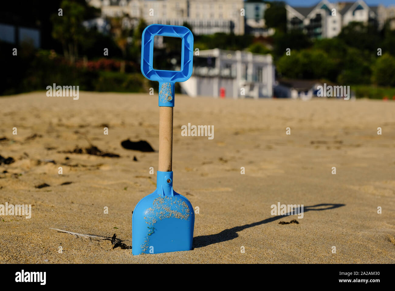 Child's spade on beach at St Ives in Cornwall Stock Photo - Alamy