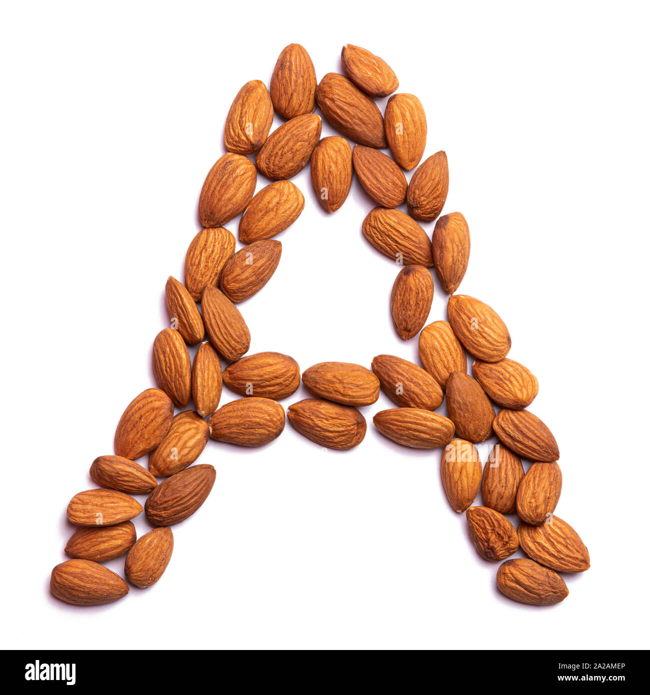 The letter "A" of the English alphabet from a peeled almond on a white ...