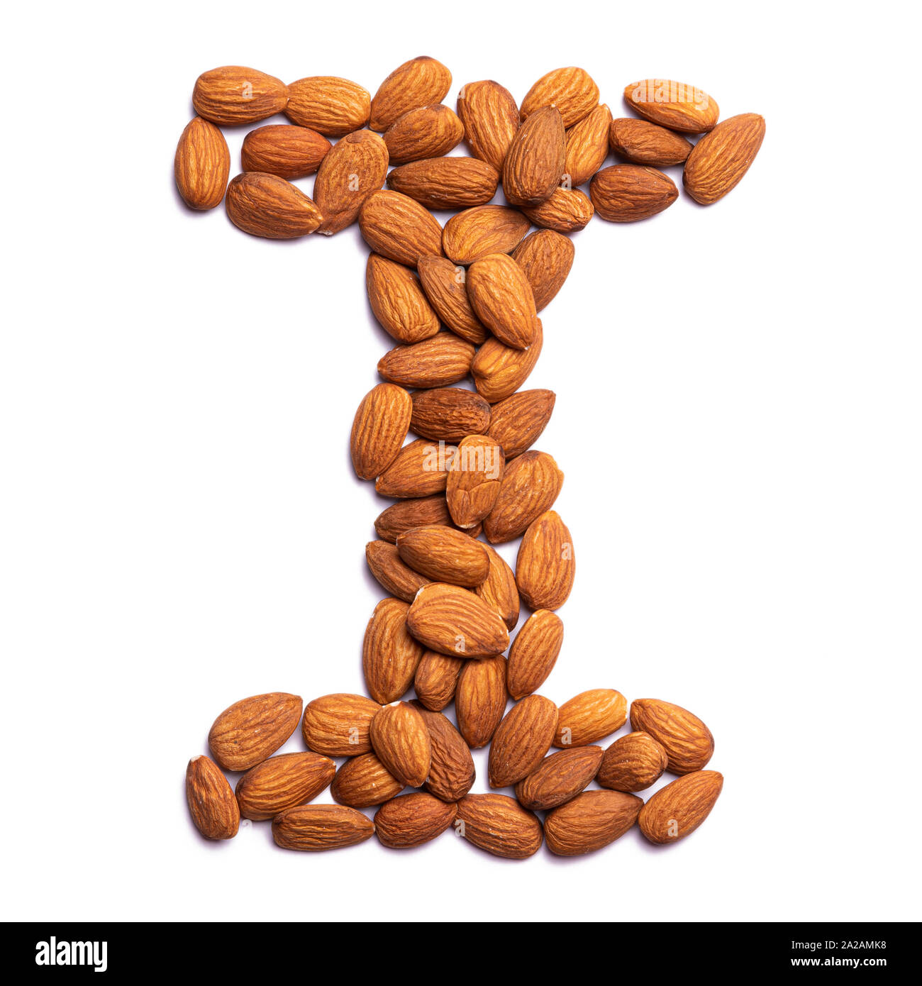 The letter "I" of the English alphabet from a peeled almond on a white ...