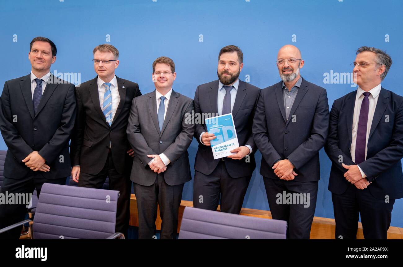 02 October 2019, Berlin: Malte Rieth (l-r), DIW Berlin, Stefan Kooths ...