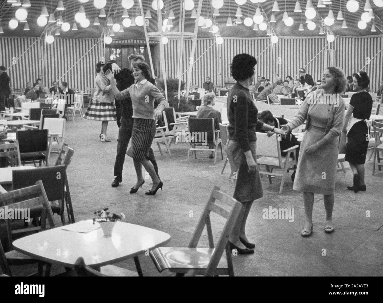 Young people dancing in a HO-tent in East Berlin Stock Photo - Alamy