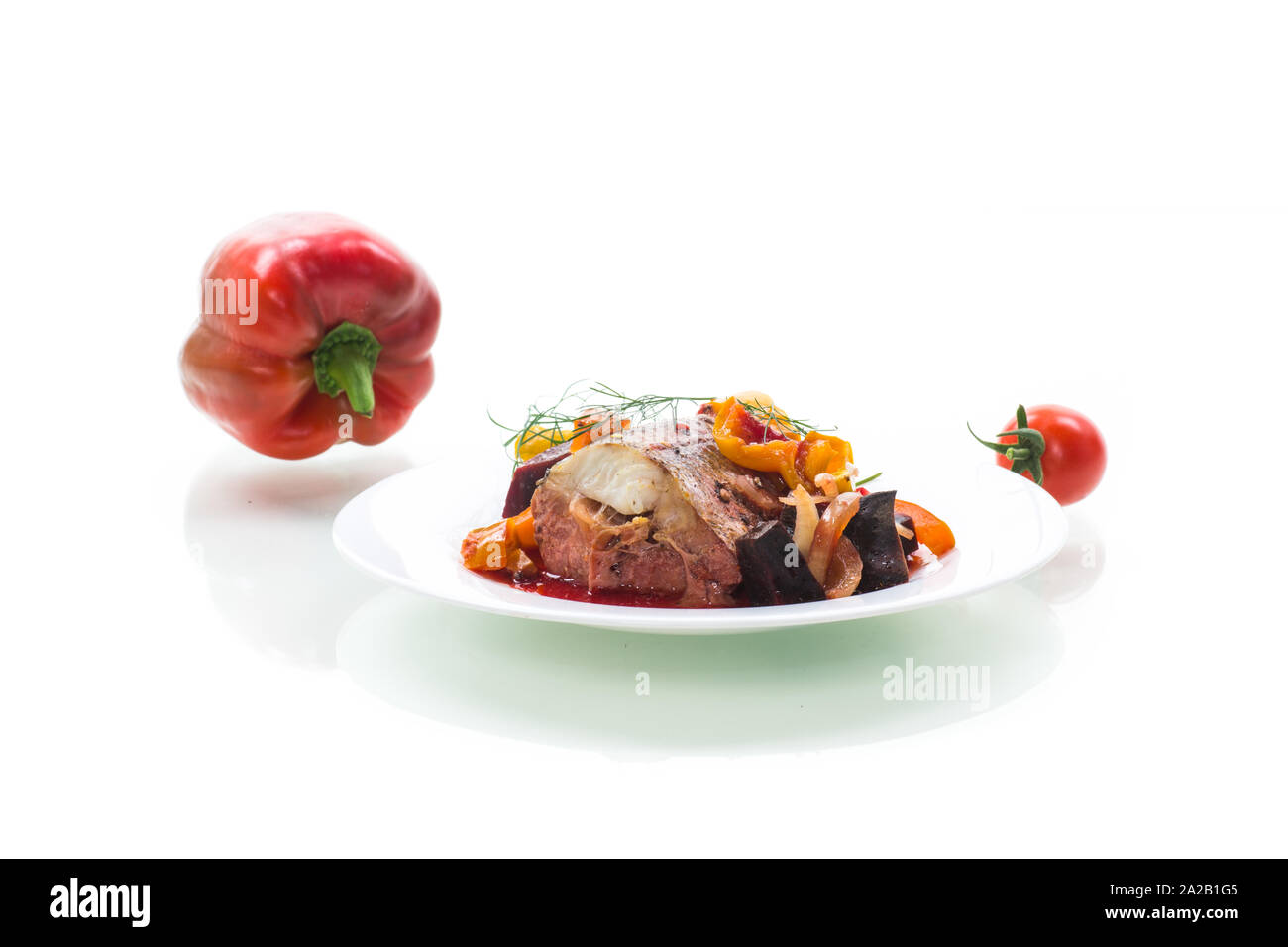fish stew with beets and other vegetables in a plate Stock Photo - Alamy