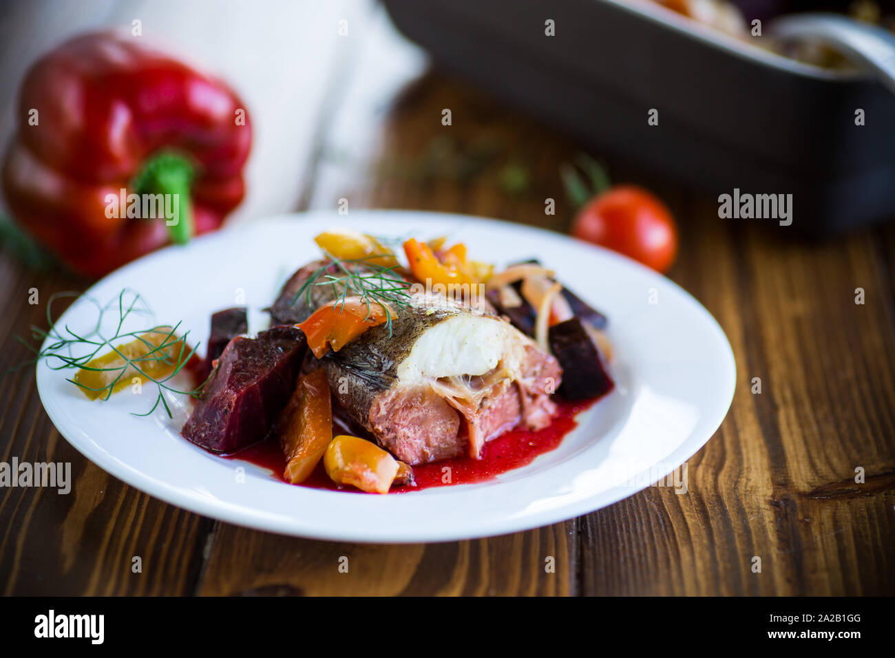 fish stew with beets and other vegetables in a plate Stock Photo - Alamy