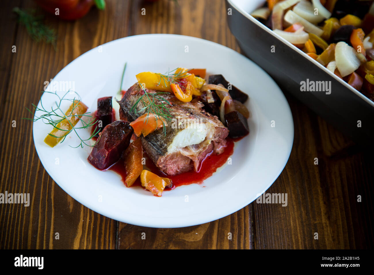 fish stew with beets and other vegetables in a plate Stock Photo - Alamy
