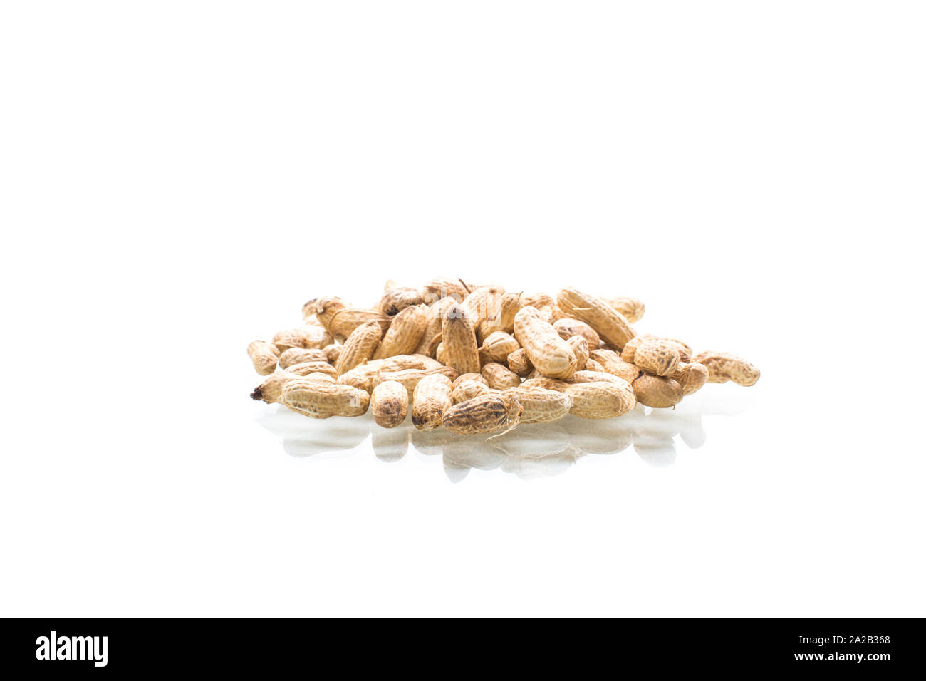 ripe organic peanuts in shell isolated on a white Stock Photo - Alamy