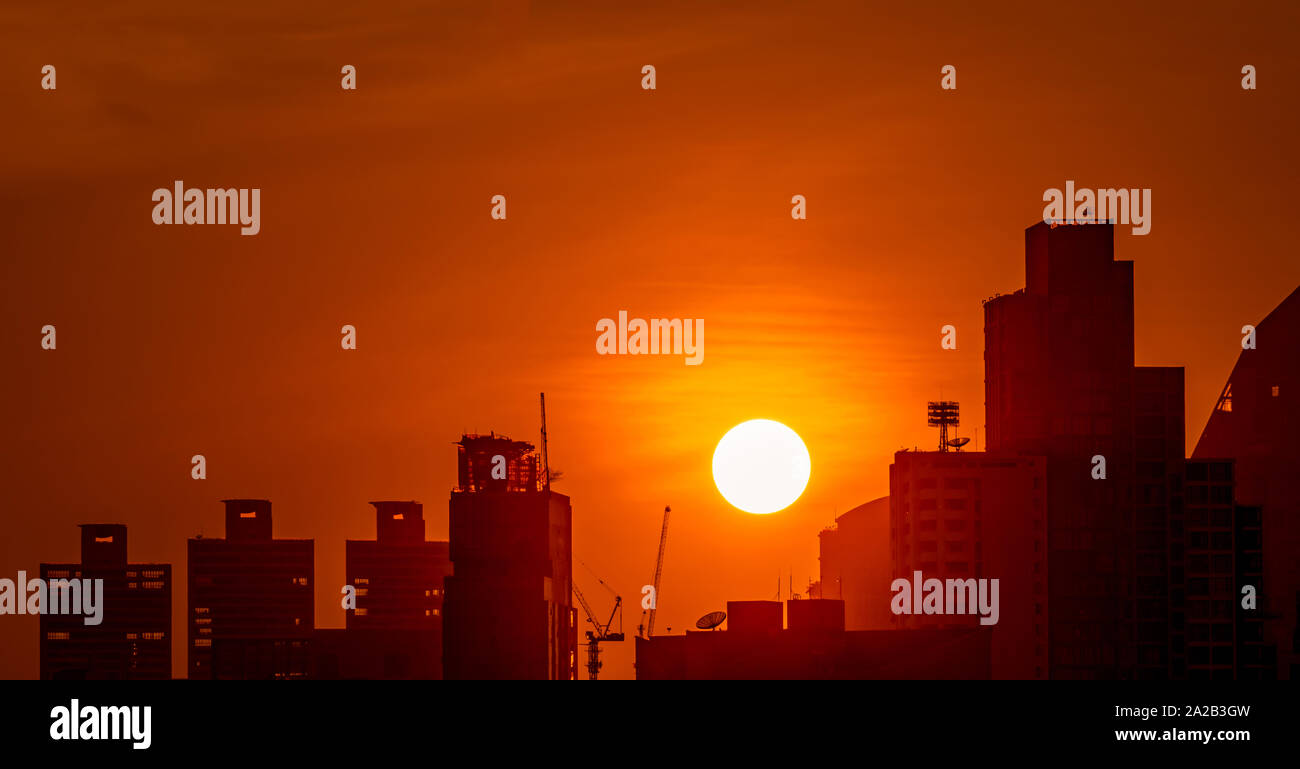 Business building in downtown at dusk with beautiful sunset sky ...