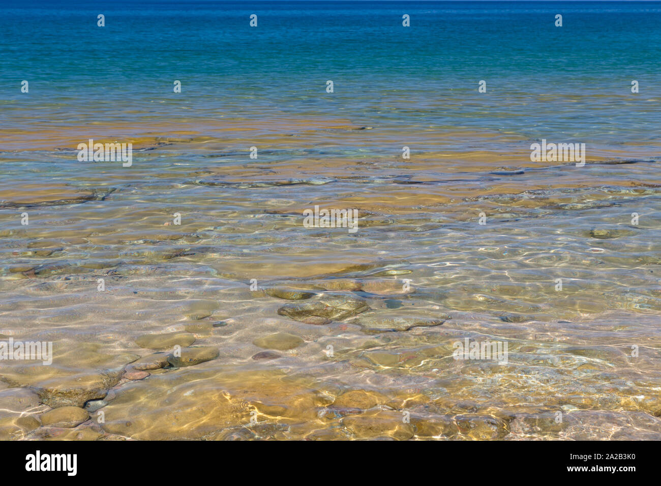 Clear water texture in blue and orange. Background of the ocean and the ...