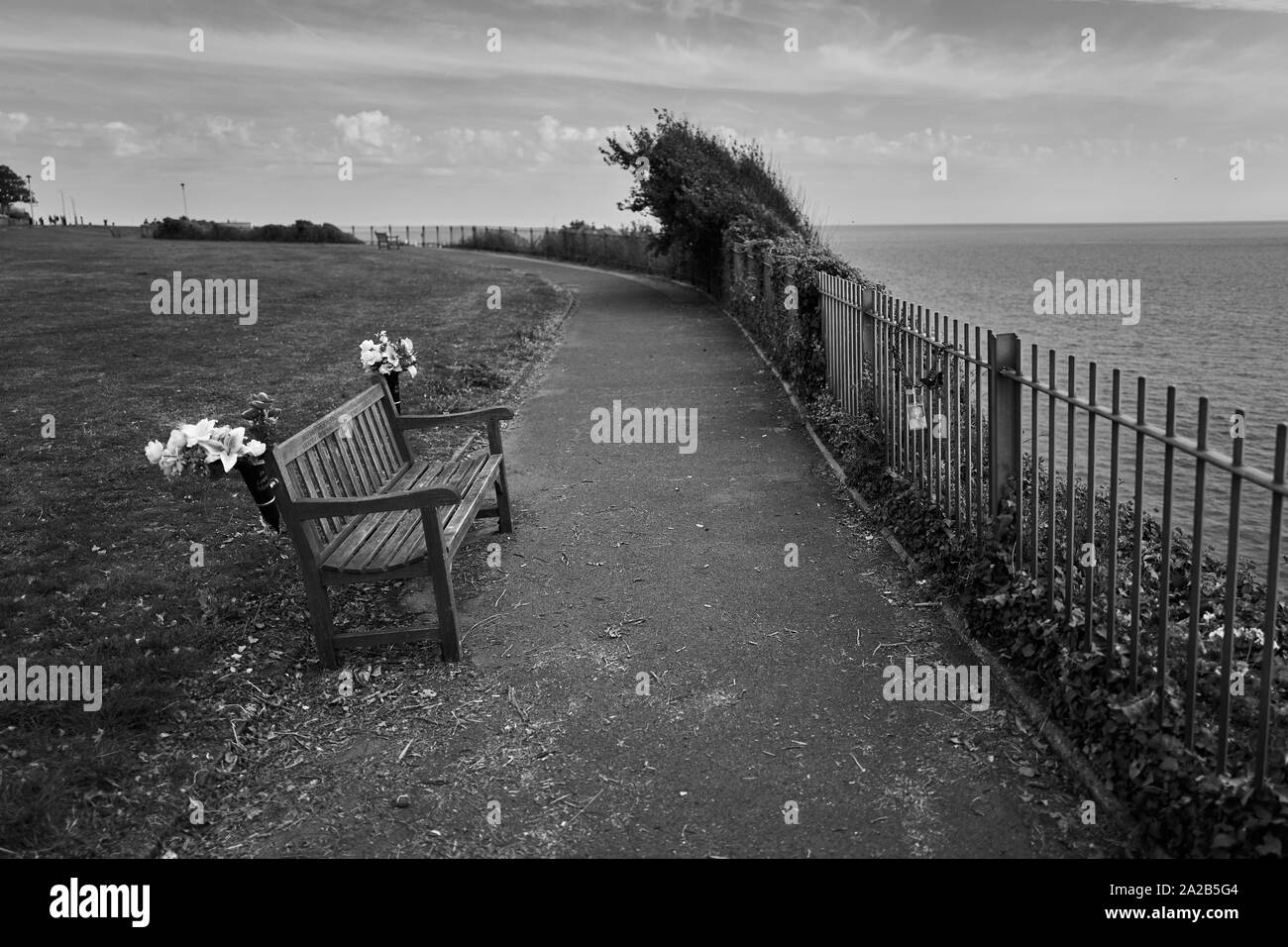 Flowers memorial bench Black and White Stock Photos & Images - Alamy