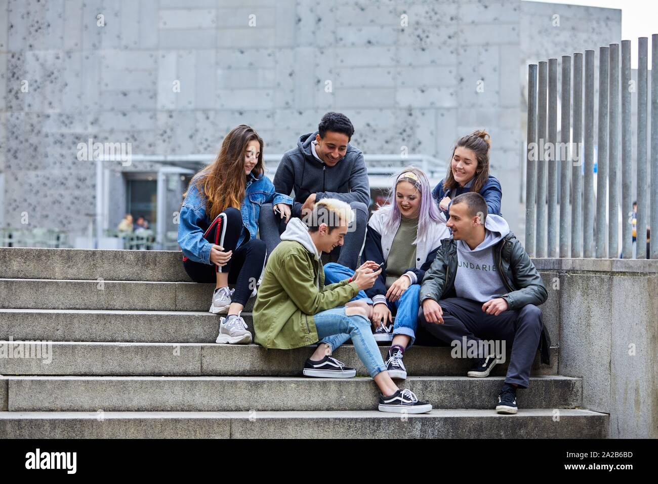 Group people on stairs hi-res stock photography and images - Alamy