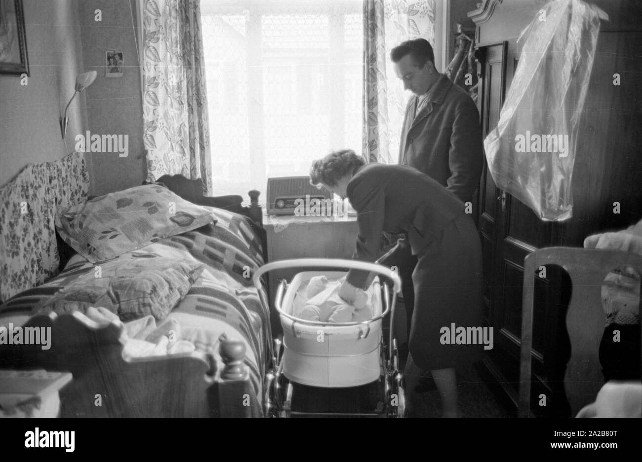 This young family lives in a cramped living situation Stock Photo - Alamy