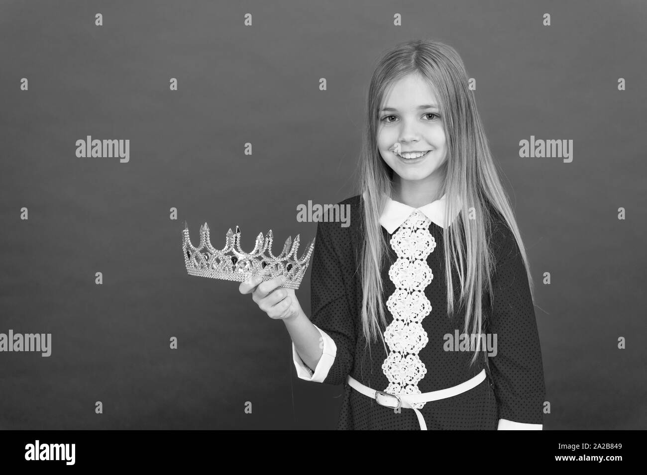 Best award for me. Kid hold golden crown symbol of princess. Happy ...