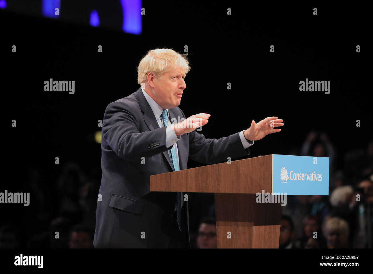 Prime Minister Boris Johnson on stage giving his speech at the ...