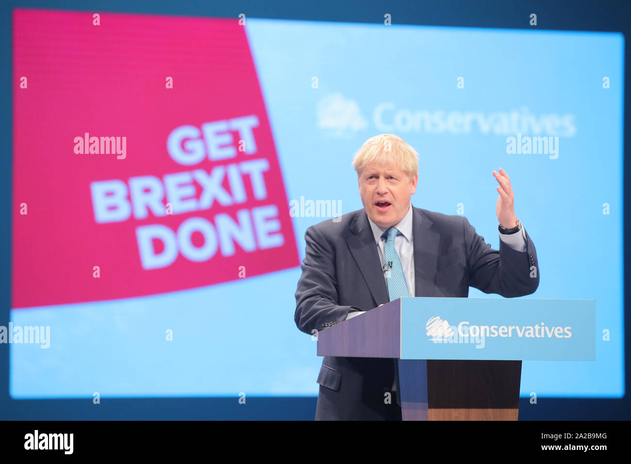 Prime Minister Boris Johnson on stage giving his speech at the ...