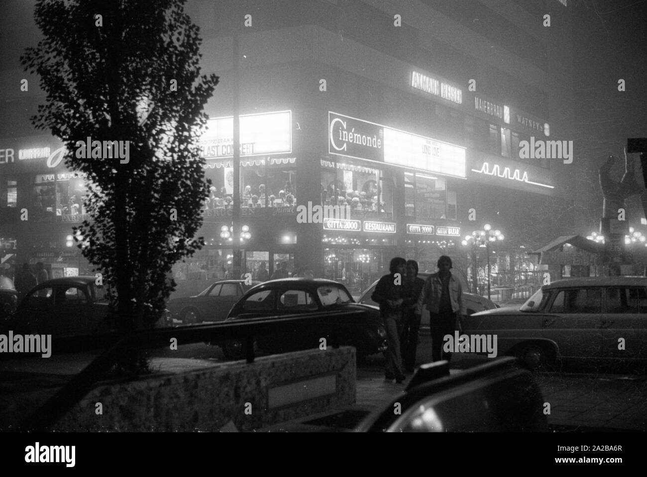 Neon sign on the facade of the "Citta 2000" complex, a shopping and ...