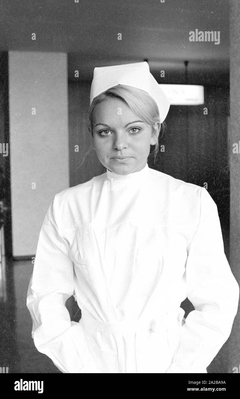 Nurse in white uniform Stock Photo - Alamy