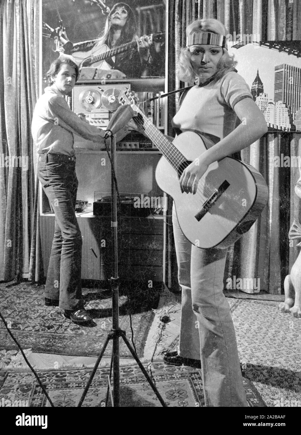 A singer records a song in the studio Stock Photo - Alamy