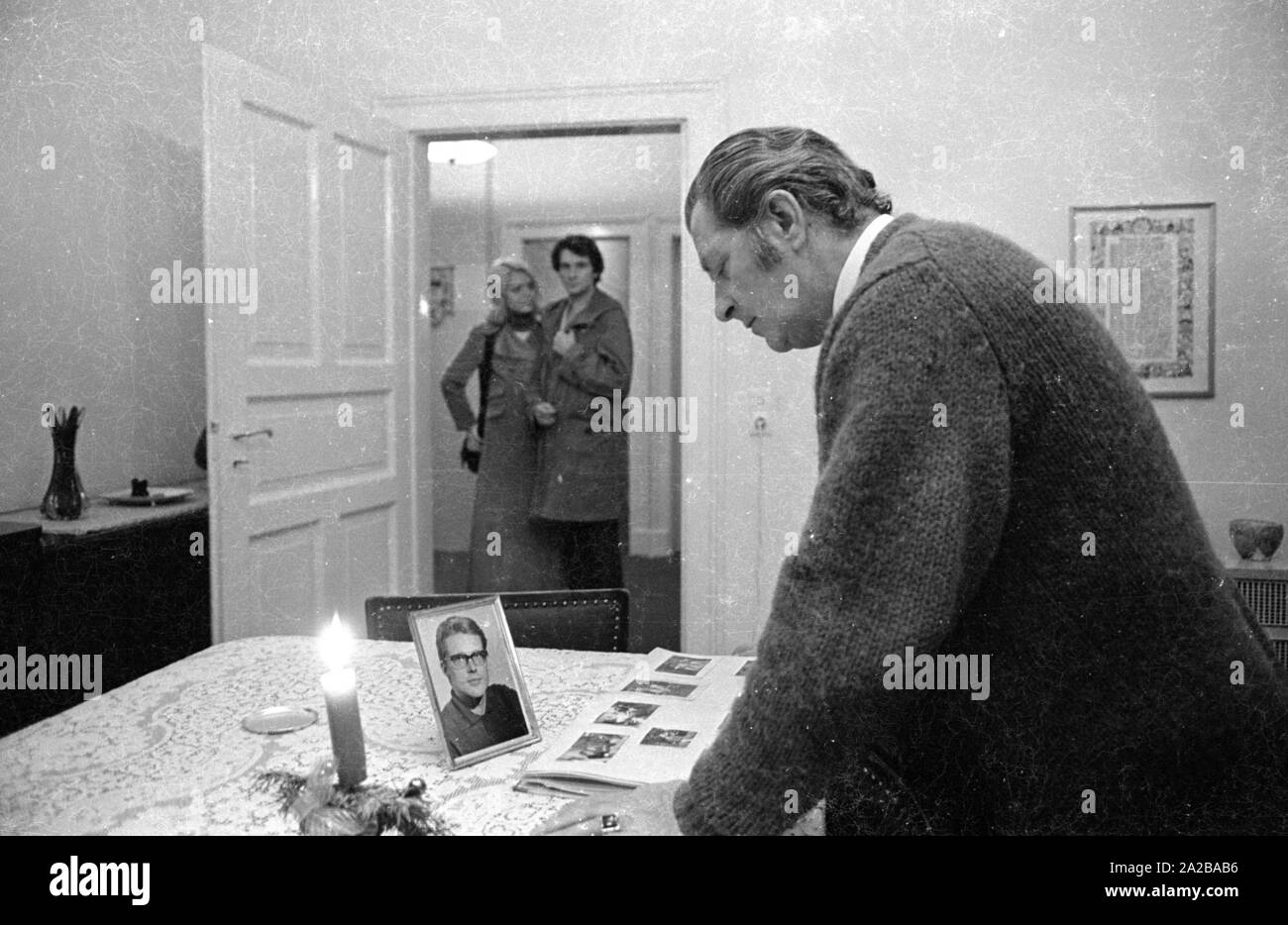 A father mourns his dead son. His friend have come to express their ...