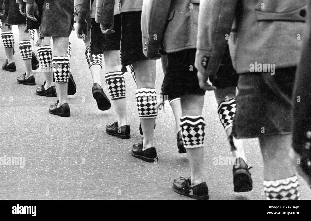 These men march in rank and file during a costume parade in a Bavarian ...