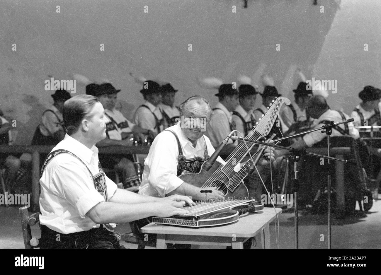In a Bavarian spa resort, alpine folk music is performed with ...