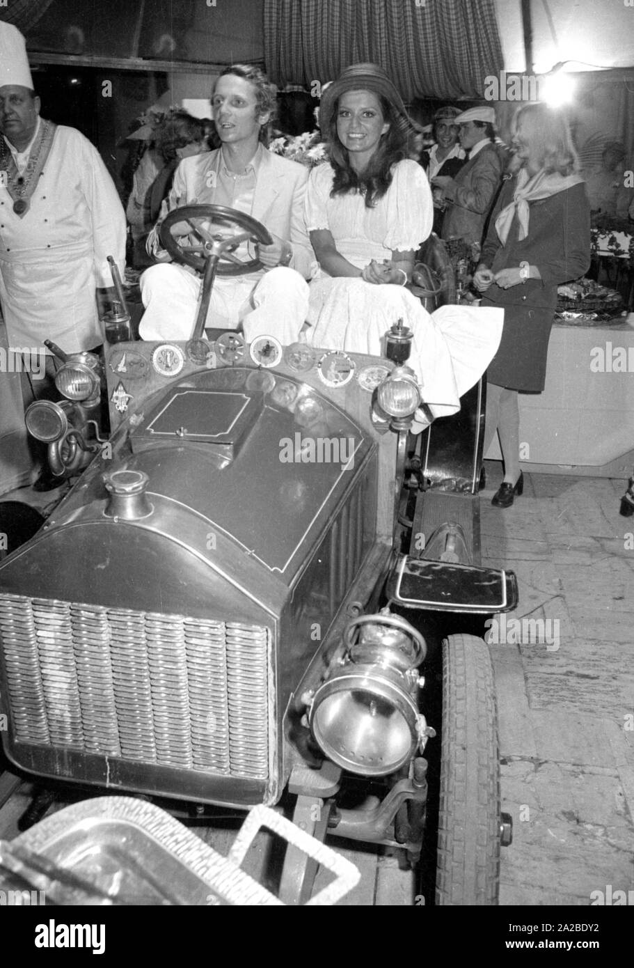 The Austrian racing driver Niki Lauda celebrates in the trendy "Why Not ...