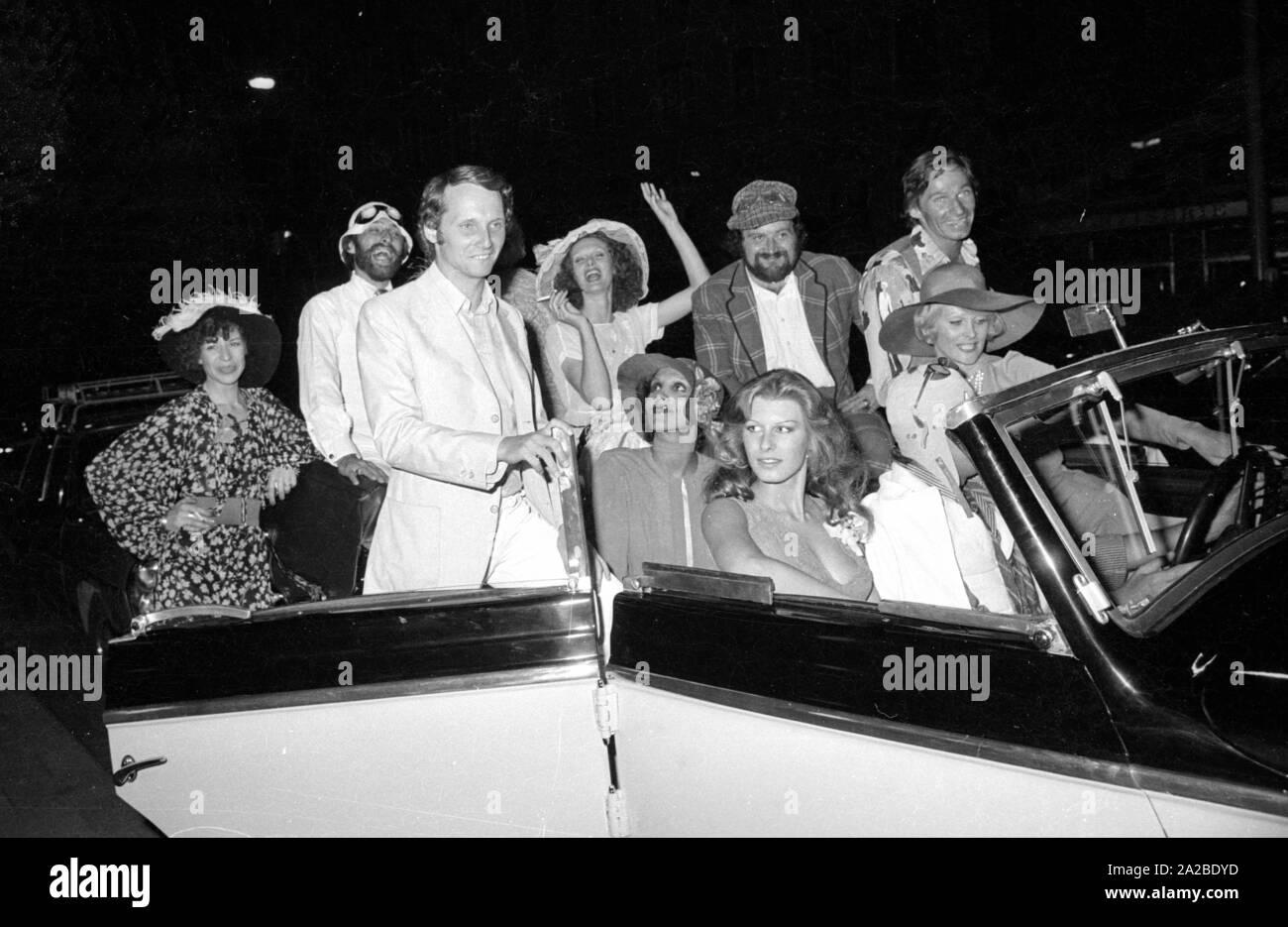 The Austrian racing driver Niki Lauda (3rd from the left) celebrates in ...