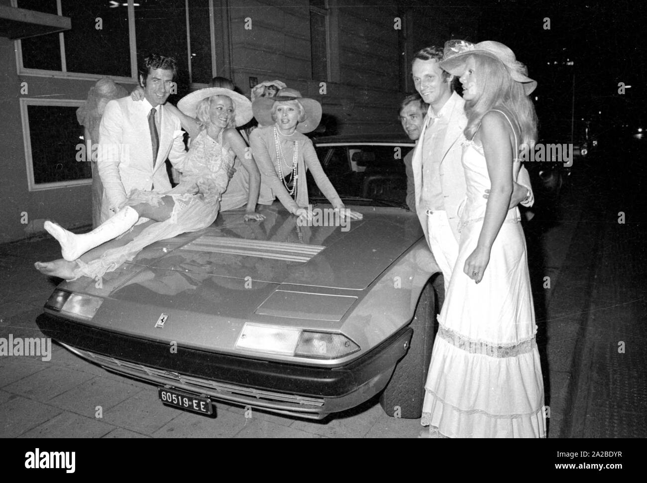 The Austrian racing driver Niki Lauda (2nd from left) celebrates in the ...