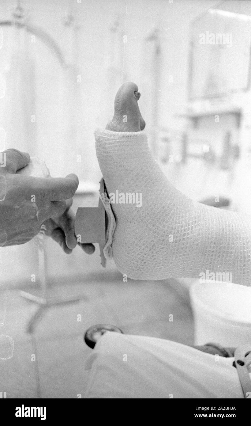 Put on a bandage Black and White Stock Photos & Images - Alamy